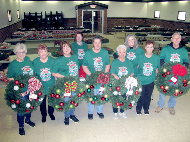Volunteers worked to decorate Main Street in Follansbee for Christmas ...